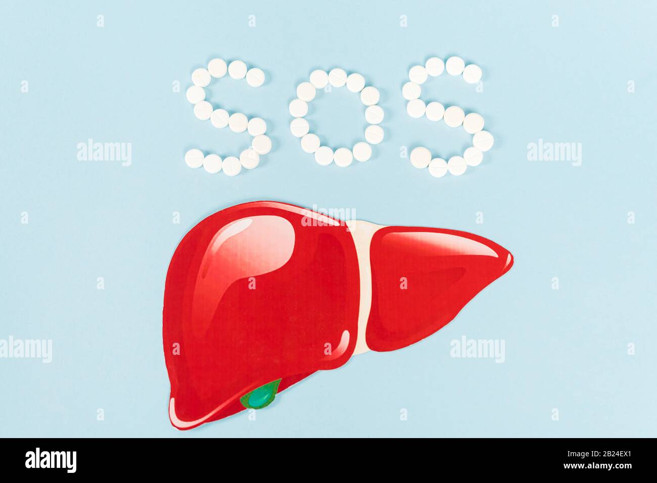 top view of sos lettering near drawn liver on blue Stock Photo - Alamy