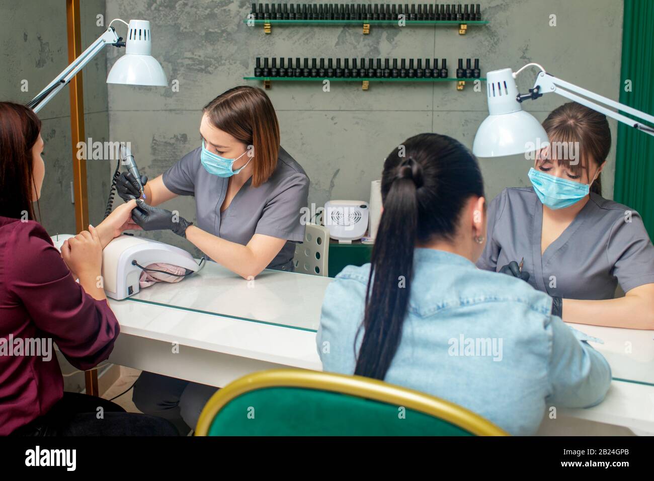 Girl getting a manicure hi-res stock photography and images - Alamy