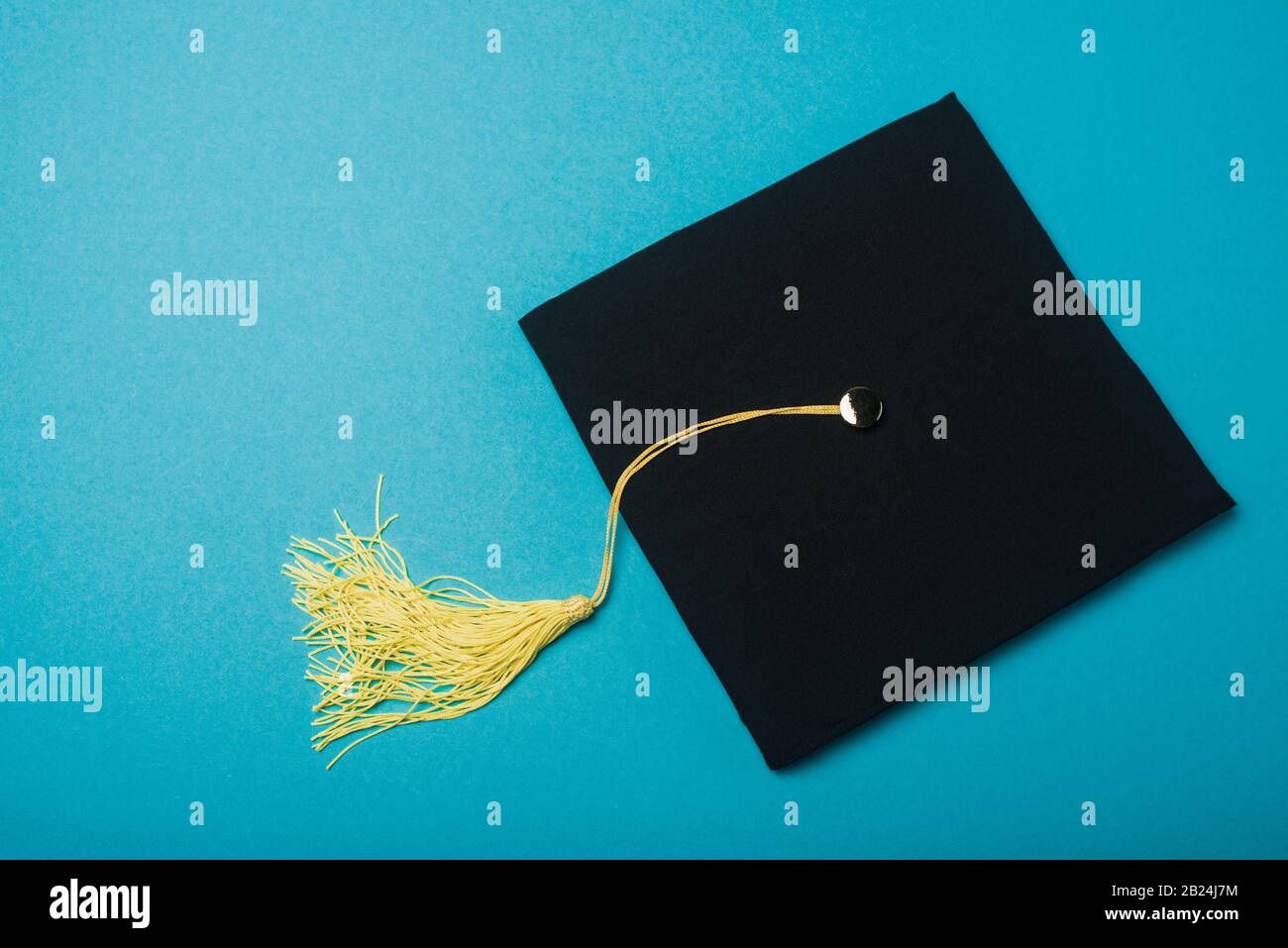Graduation blue and yellow hi-res stock photography and images - Alamy