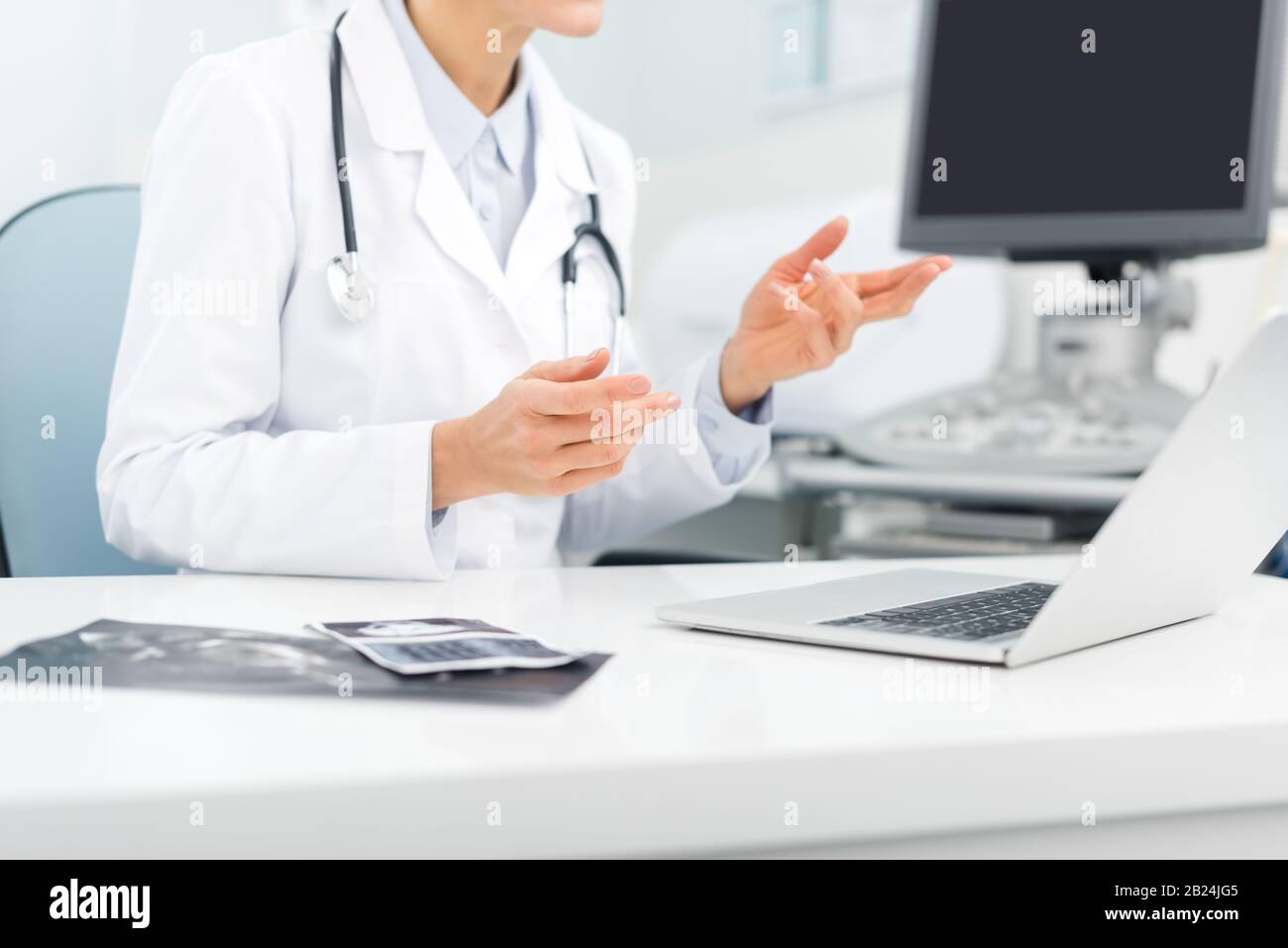 Professional female doctor working on hi-res stock photography and ...
