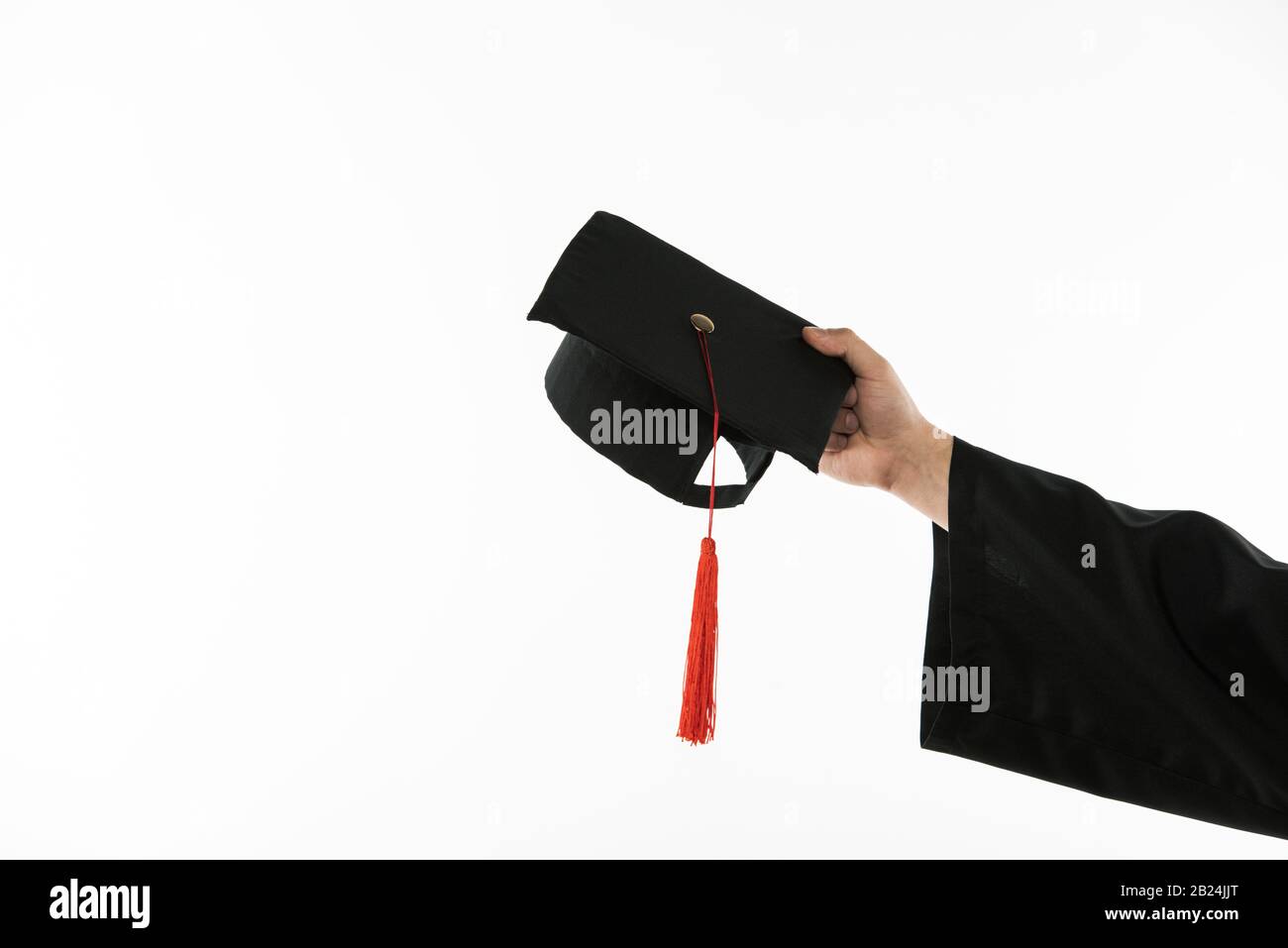 Graduation black and red cap and gown hi-res stock photography and ...