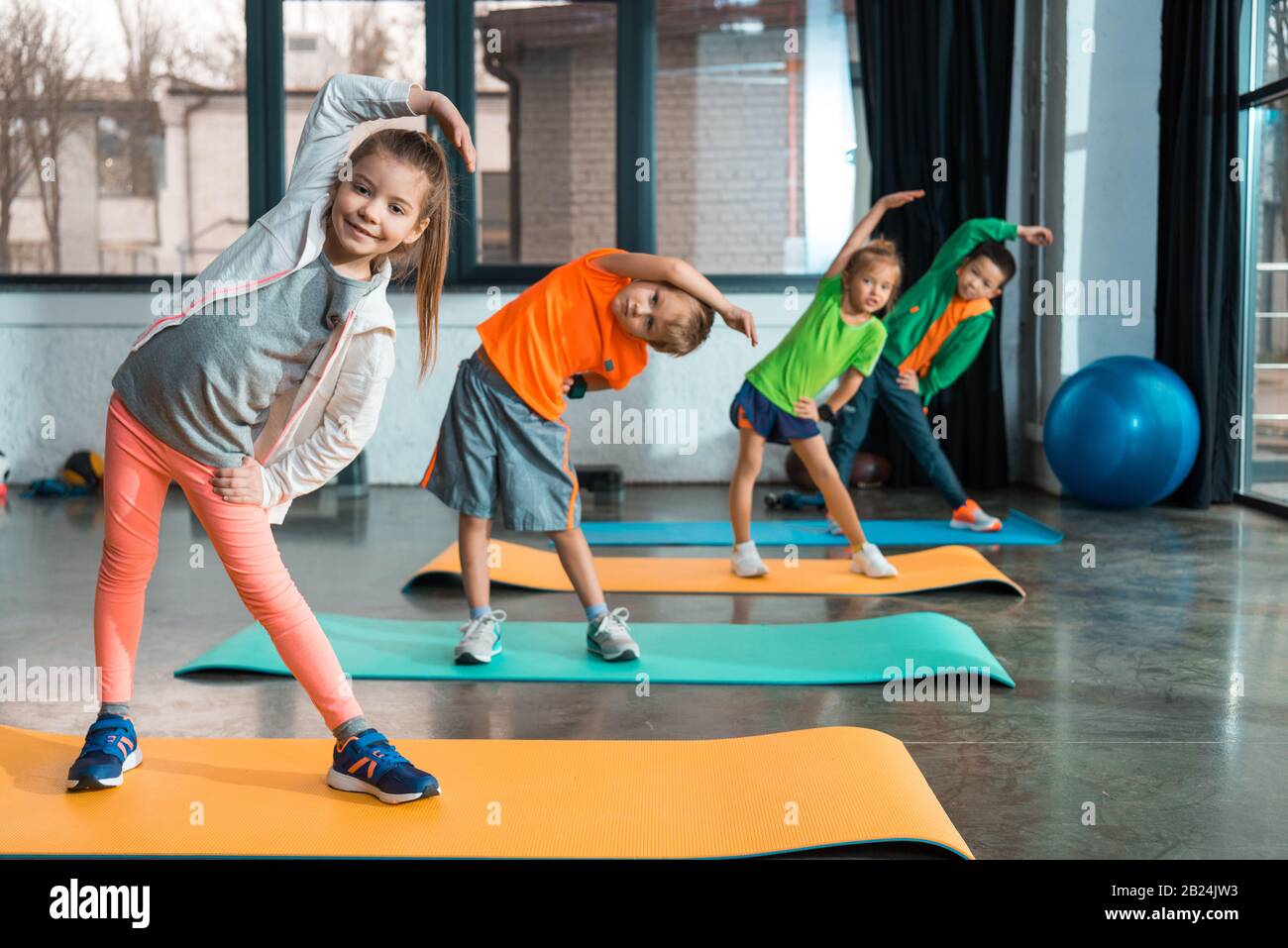 Kids warm up exercise hi-res stock photography and images - Alamy