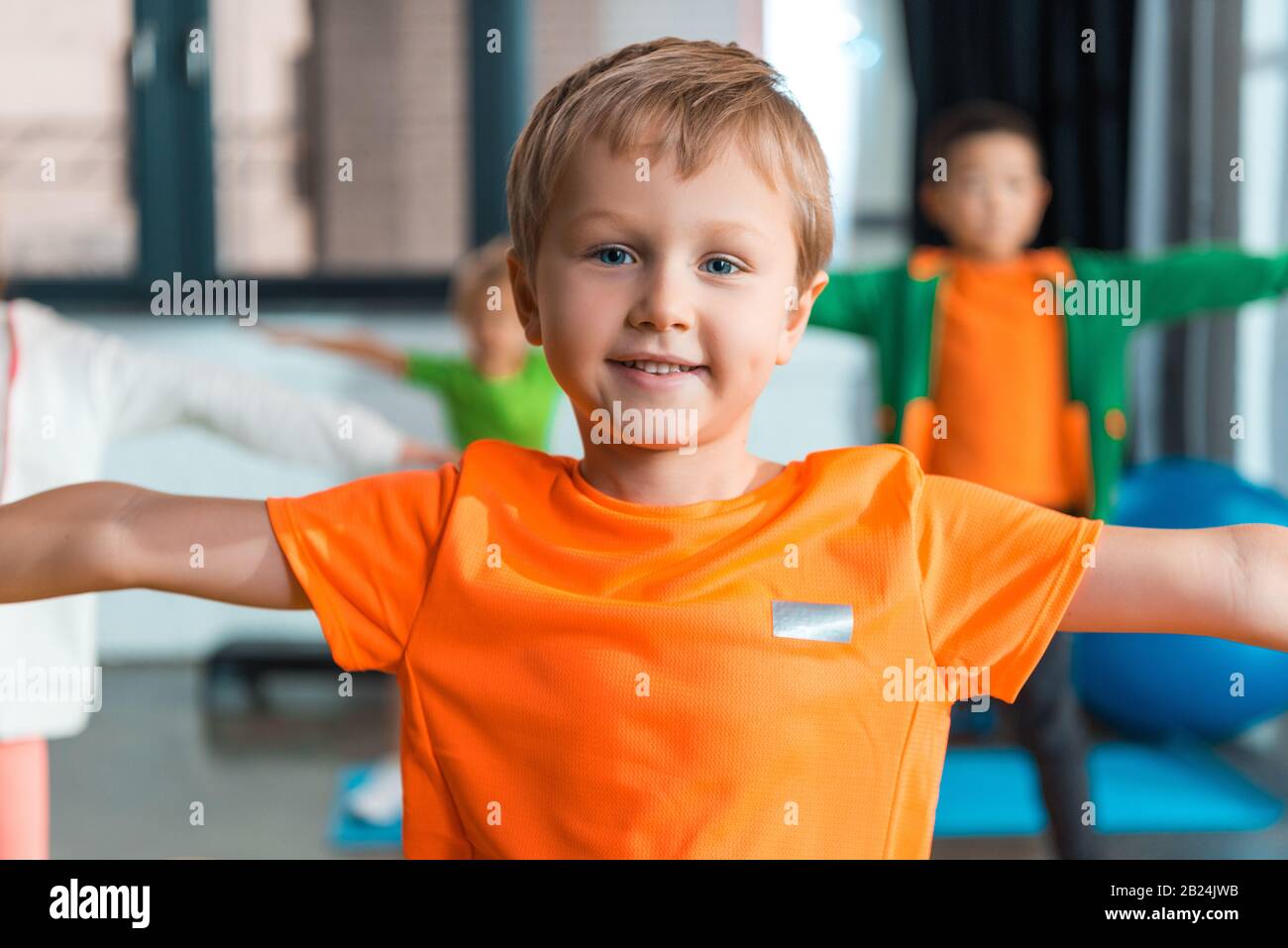 Smiling group sports kids hi-res stock photography and images - Alamy