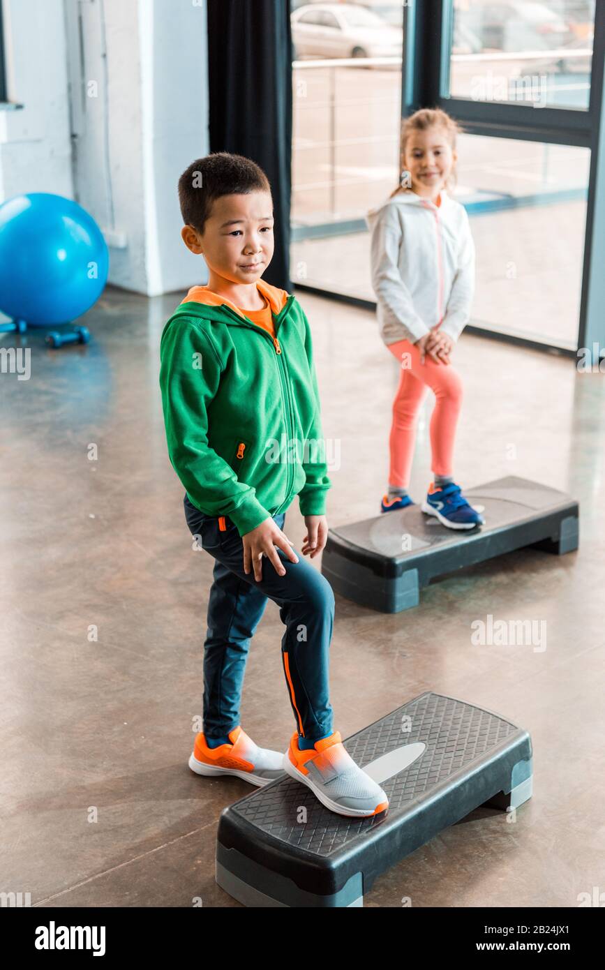 Girl step on boy hi-res stock photography and images - Alamy