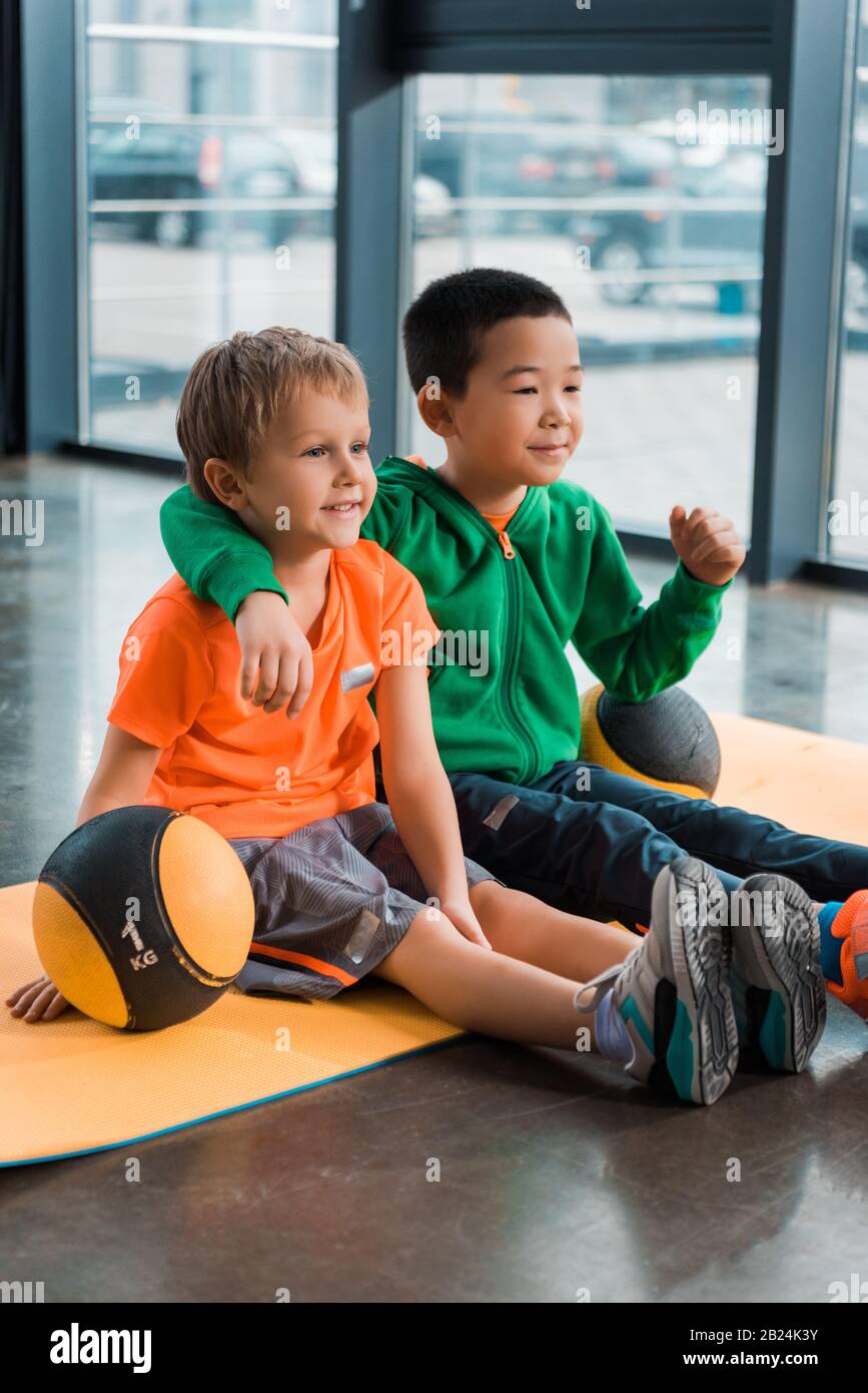 Children Sitting Exercise Mat High Resolution Stock Photography and ...