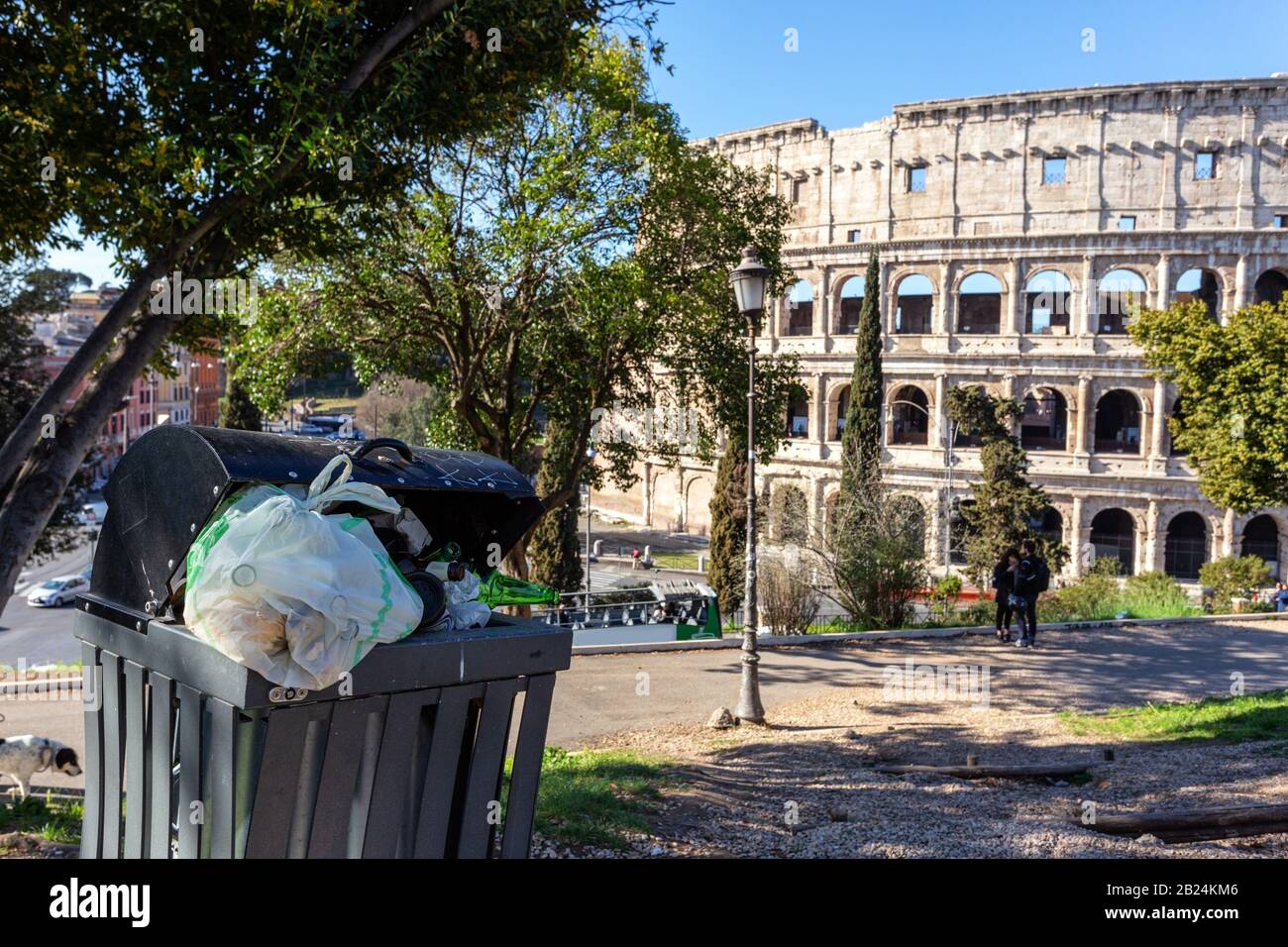 Accumulation of garbage in a park near the Coliseum. Italy, Rome ...