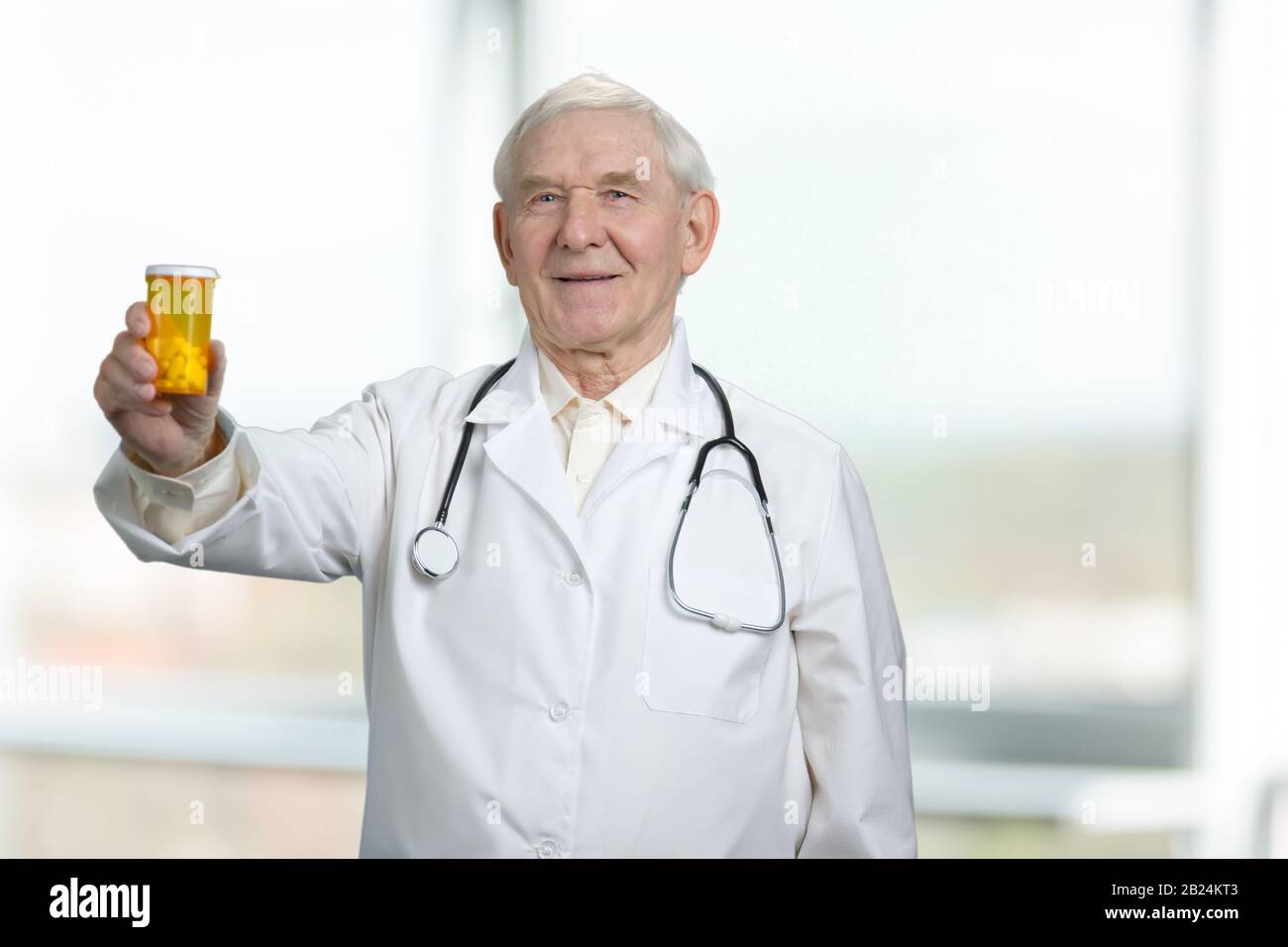 Pharmacist hold pill bottle hi-res stock photography and images - Alamy