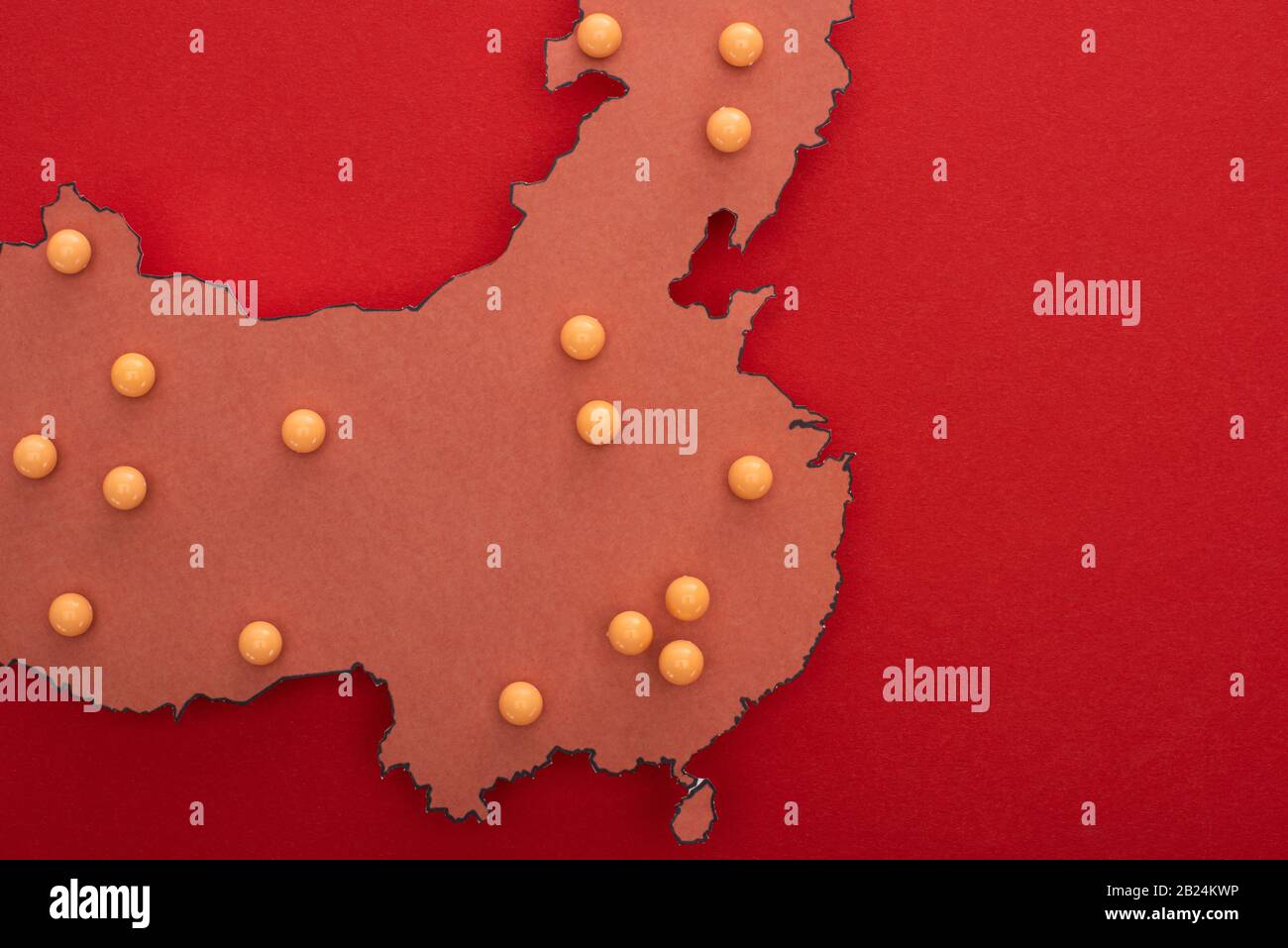 Top view of map of china with yellow push pins on red background Stock ...