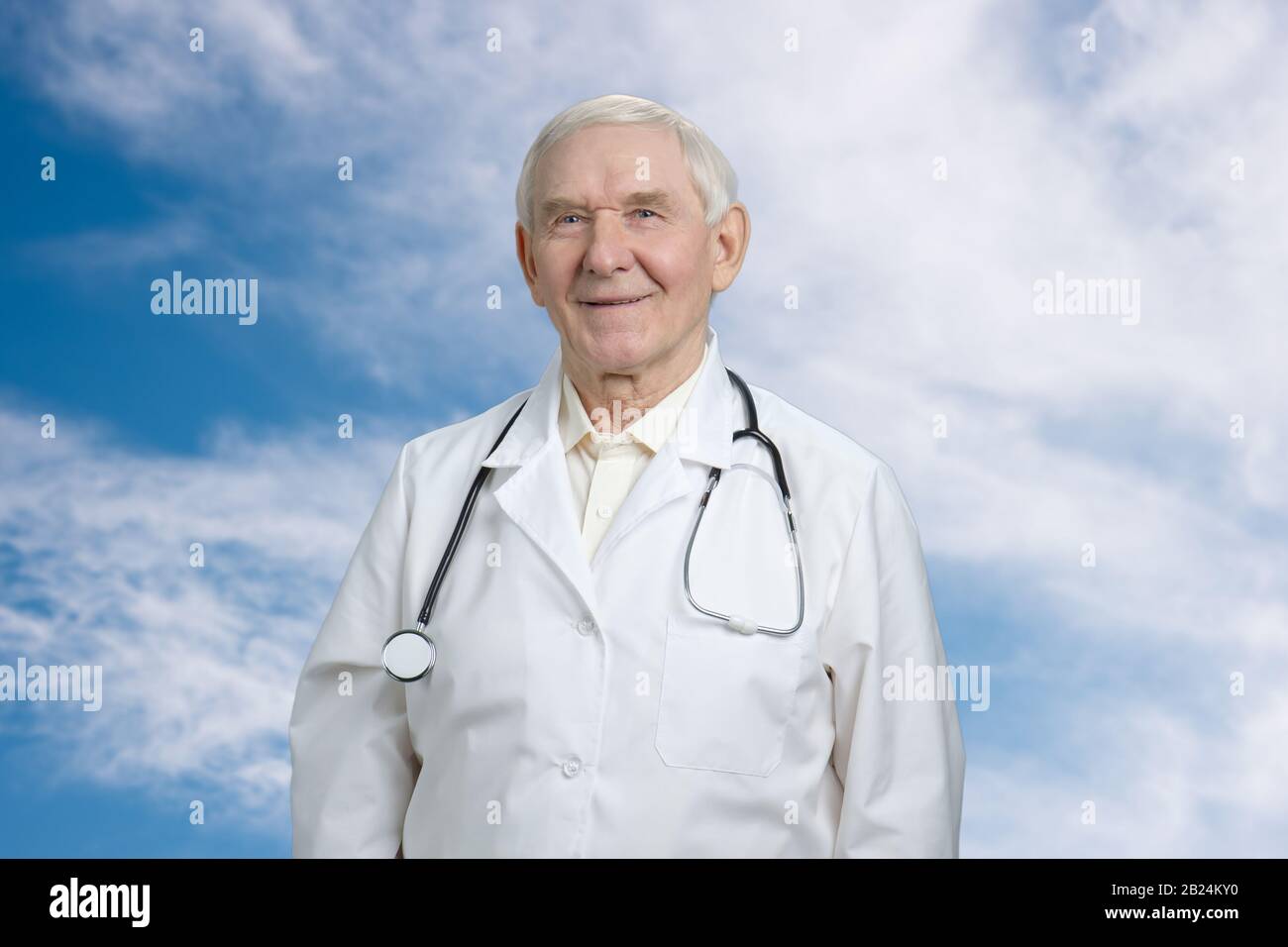 Smiling caucasian doctor wearing stethoscope Stock Photo - Alamy