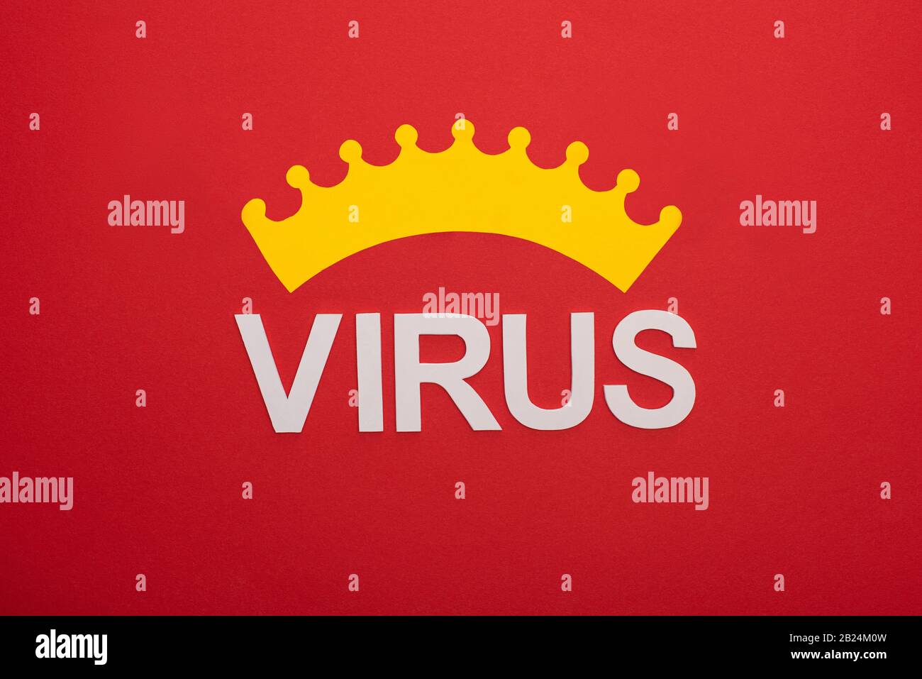 Top view of crown and virus lettering isolated on red Stock Photo - Alamy