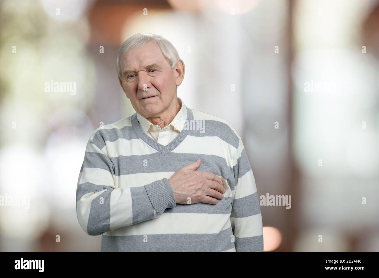 Old man chest pain hi-res stock photography and images - Alamy