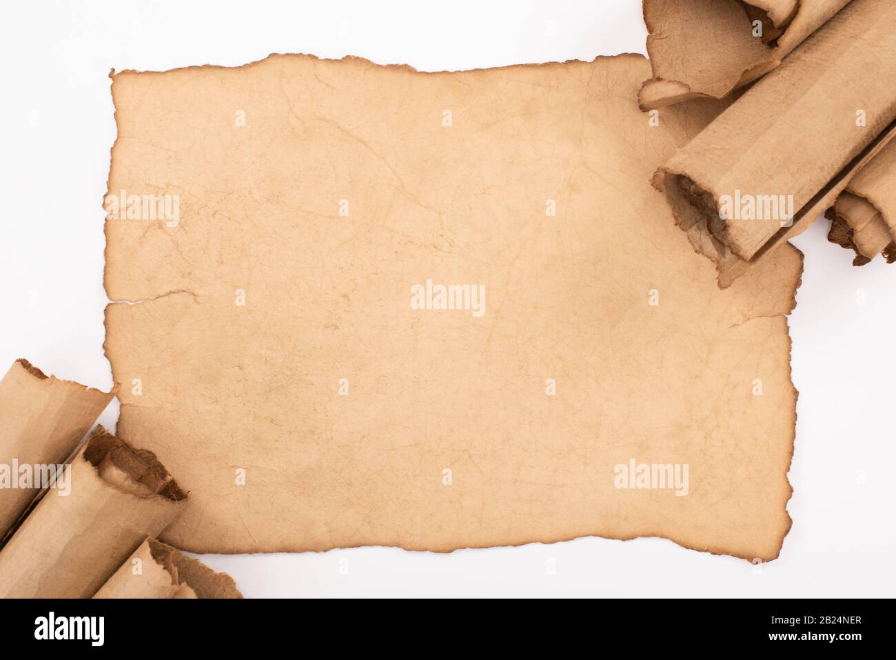 top view of vintage blank and rolled paper isolated on white Stock ...