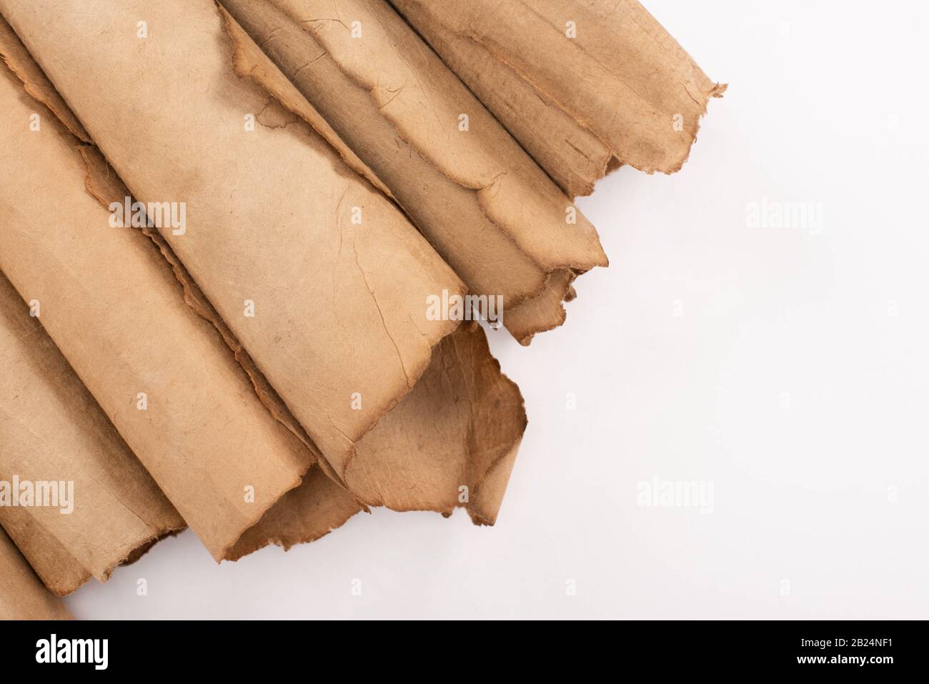 top view of vintage rolled aged paper isolated on white Stock Photo - Alamy