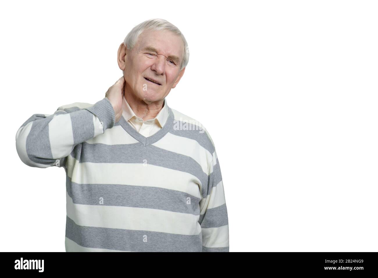 Old senior man feels pain in his neck Stock Photo - Alamy