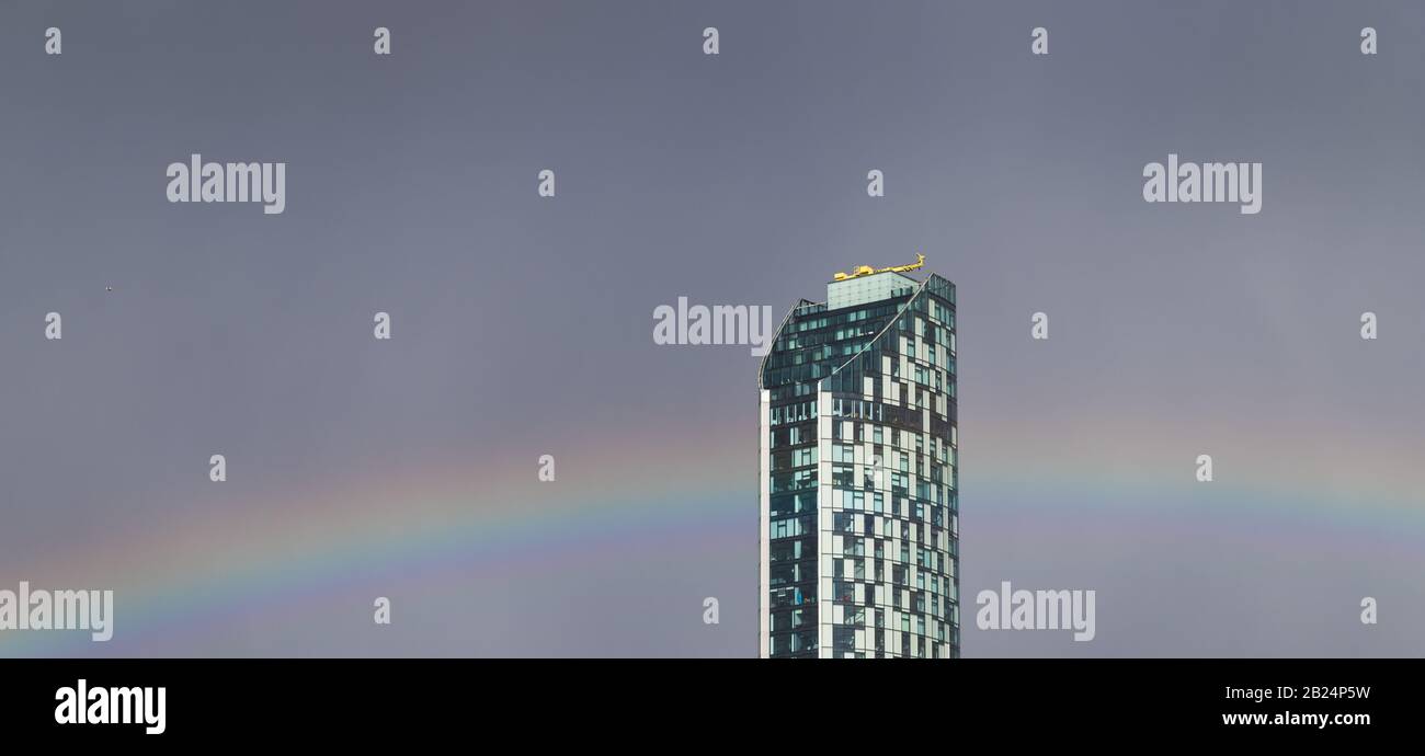A rainbow seen either side of the West Tower Building in Liverpool on ...