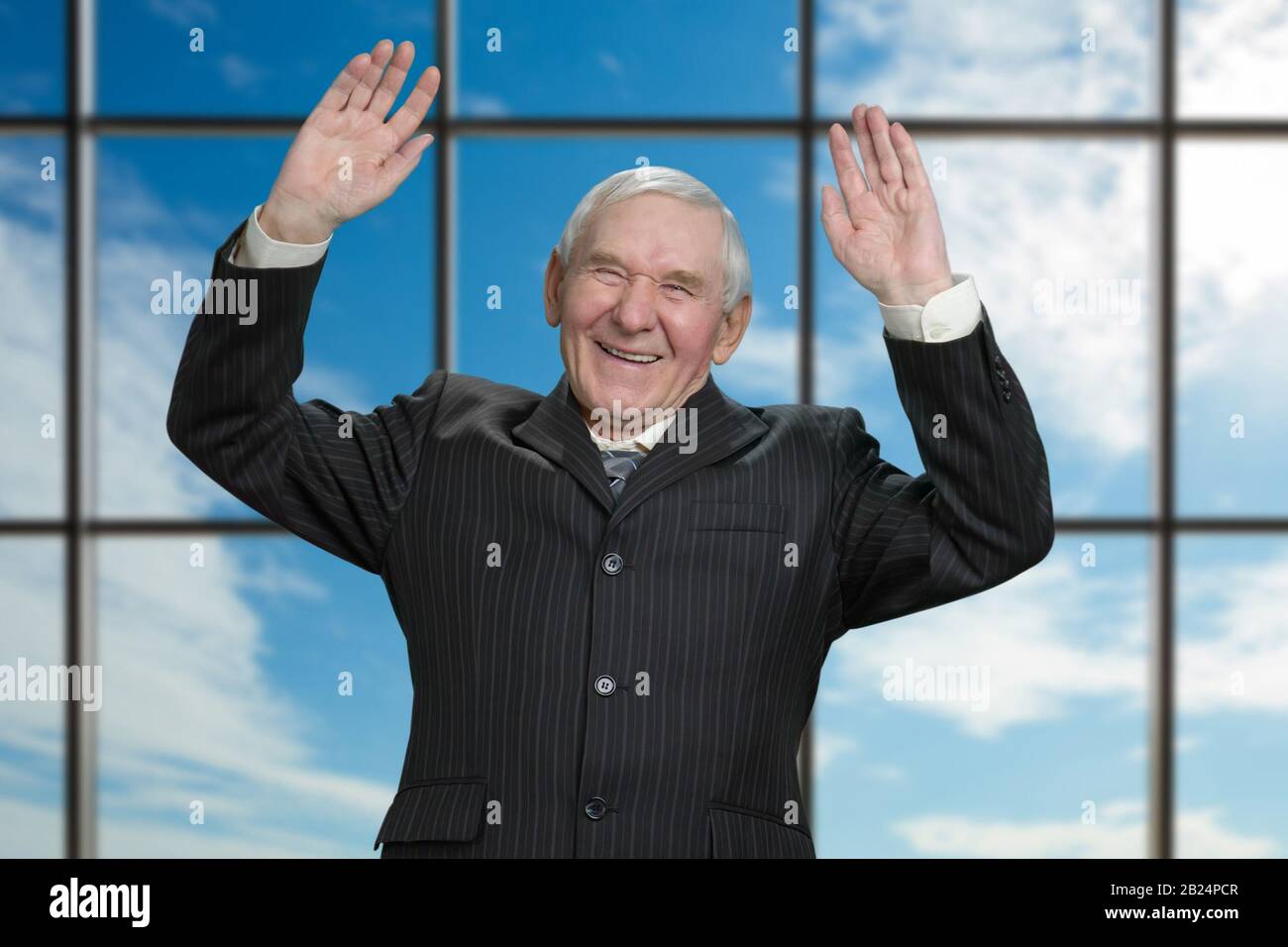 Extremely happy cheerful businessman is laughing hard Stock Photo - Alamy