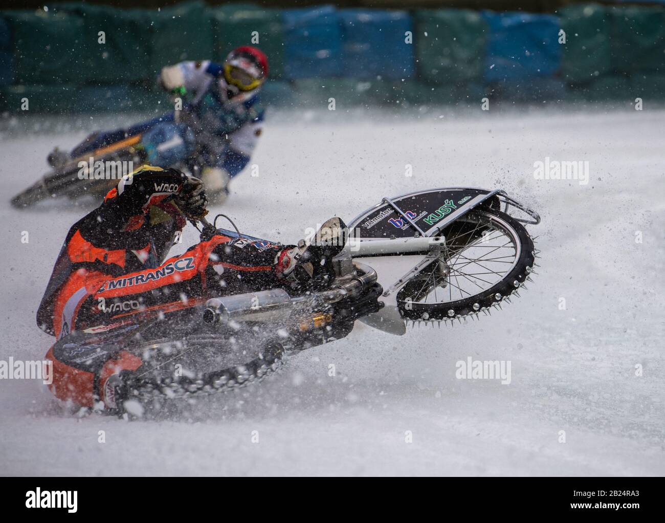 Berlin, Germany. 29th Feb, 2020. An ice speedway rider, crashes on the ...