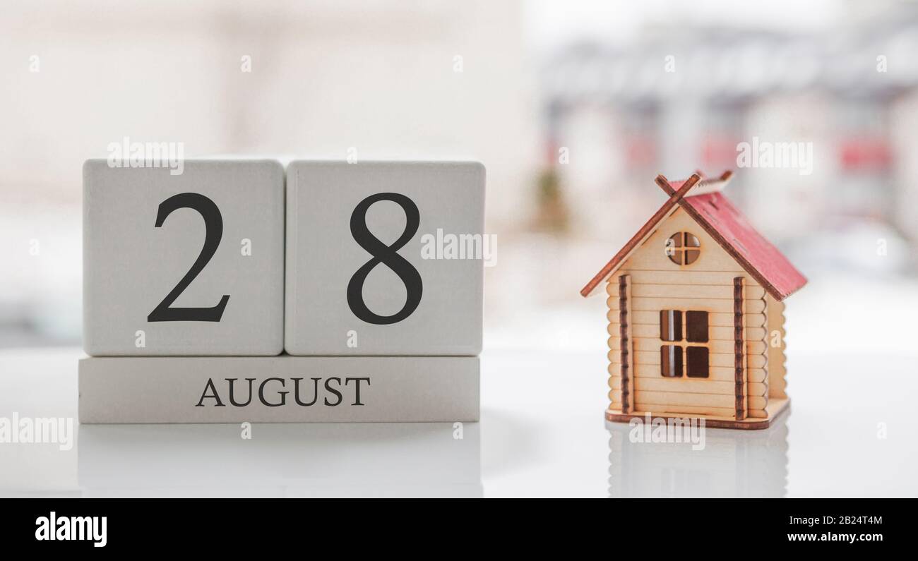 August calendar and toy home. Day 28 of month. Card message for print ...