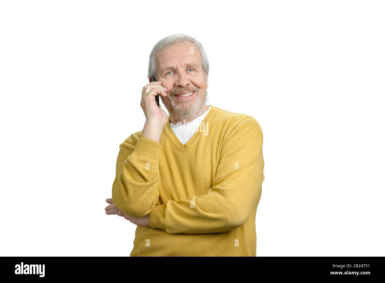 Portrait of grandpa having phone conversation Stock Photo - Alamy