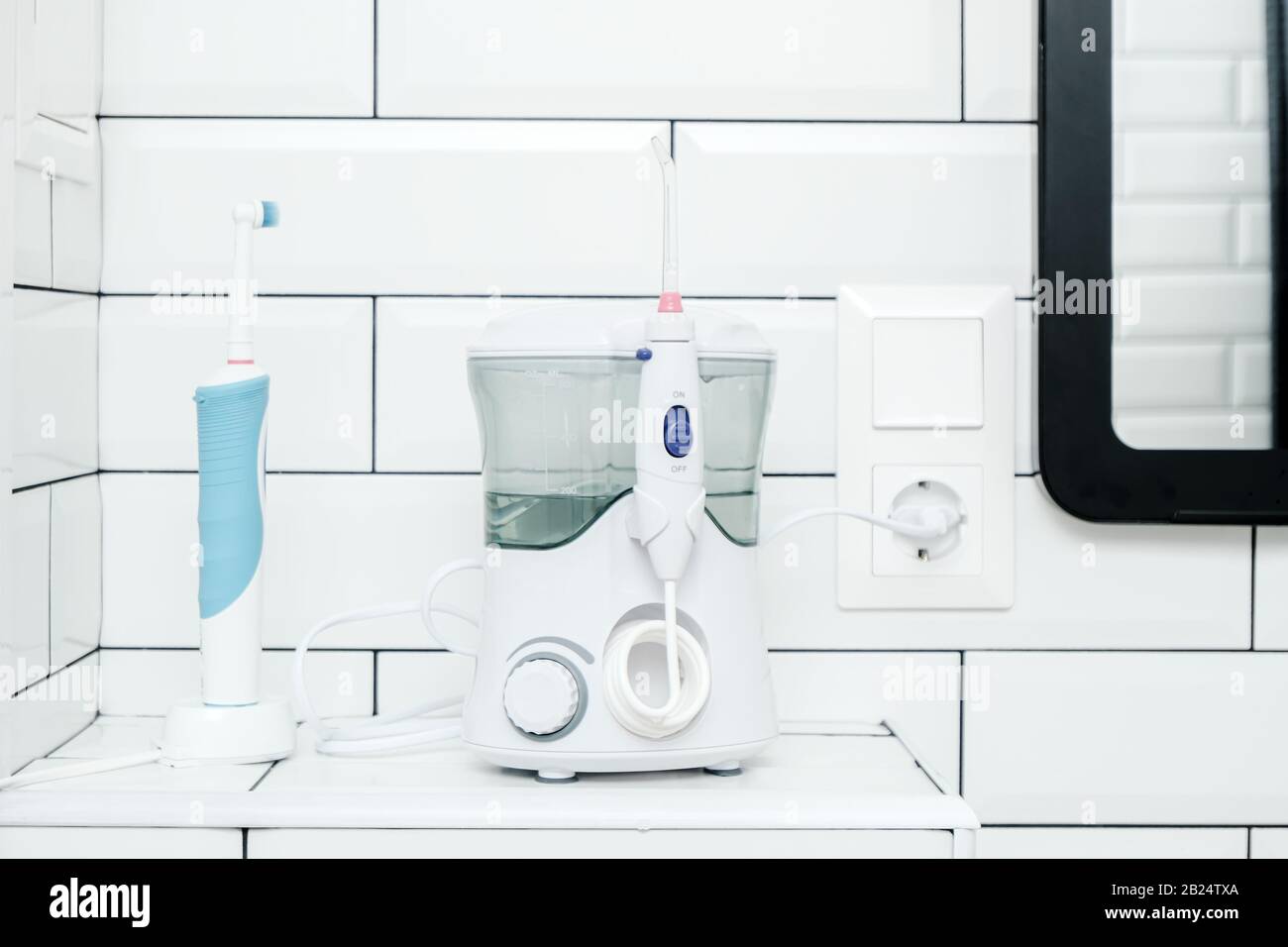 Bathtub with irrigator hi-res stock photography and images - Alamy