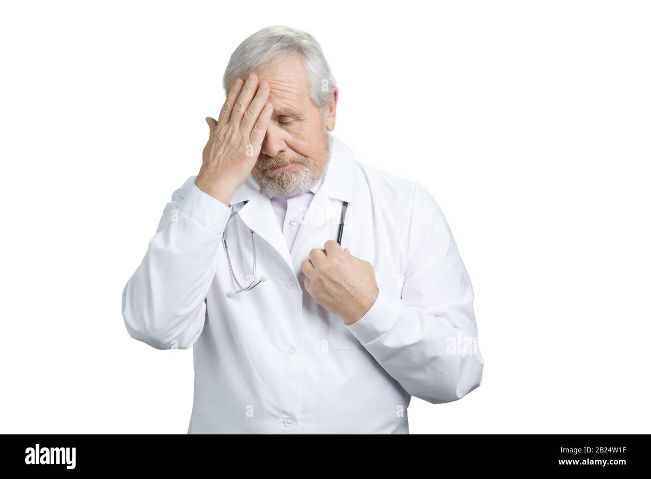 Portrait of doctor with headache Stock Photo - Alamy