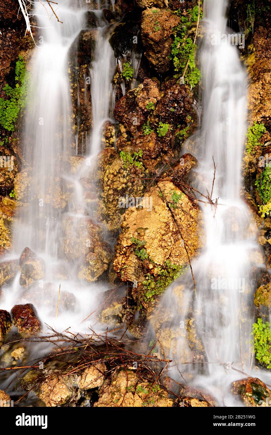 Streams of water for a little waterfall Stock Photo - Alamy