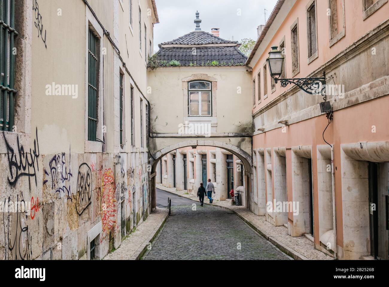 An arch connecting two buildings in lisbon portugal arch, connecting ...