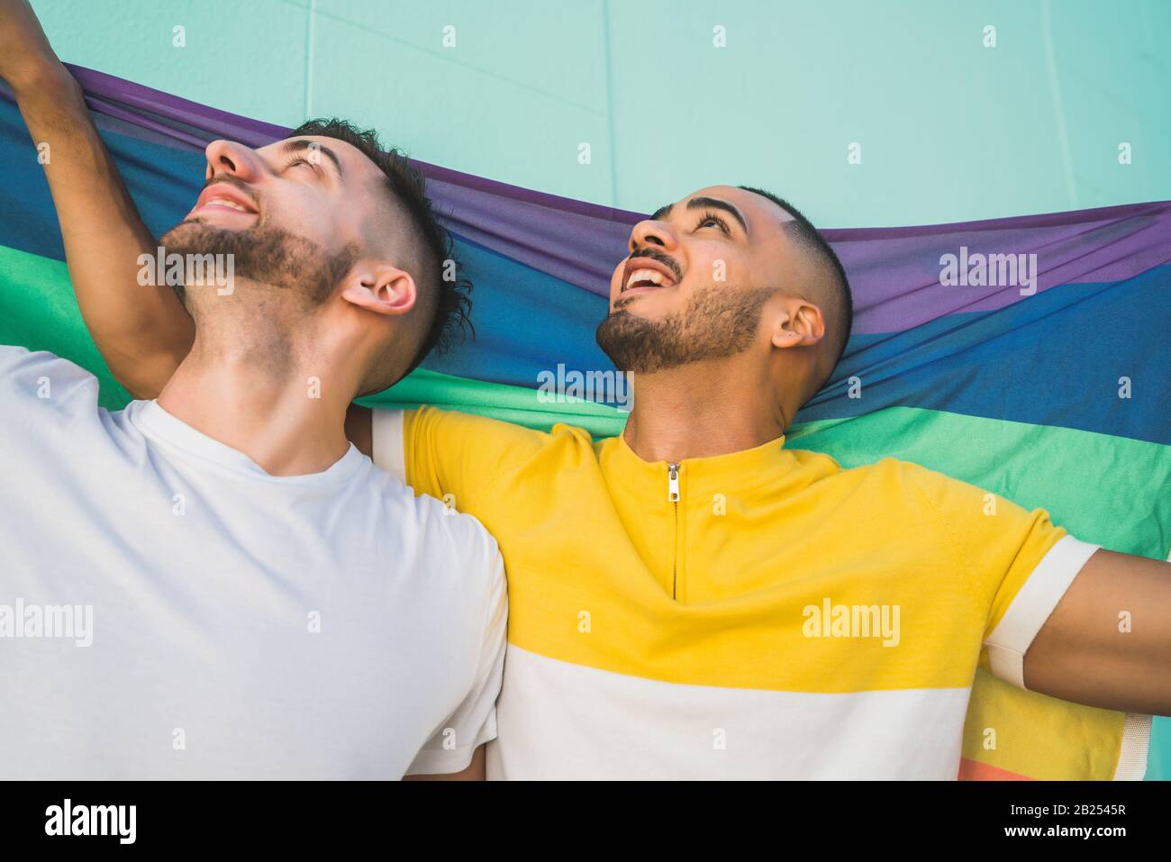 Portrait Of Young Gay Couple Embracing And Showing Their Love With