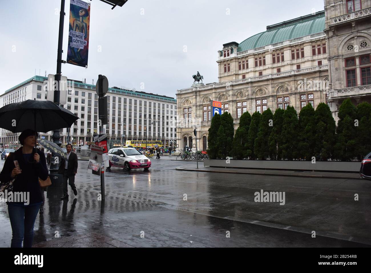 Vienna cityscape with pedestrians, cars and famous buildings Stock ...