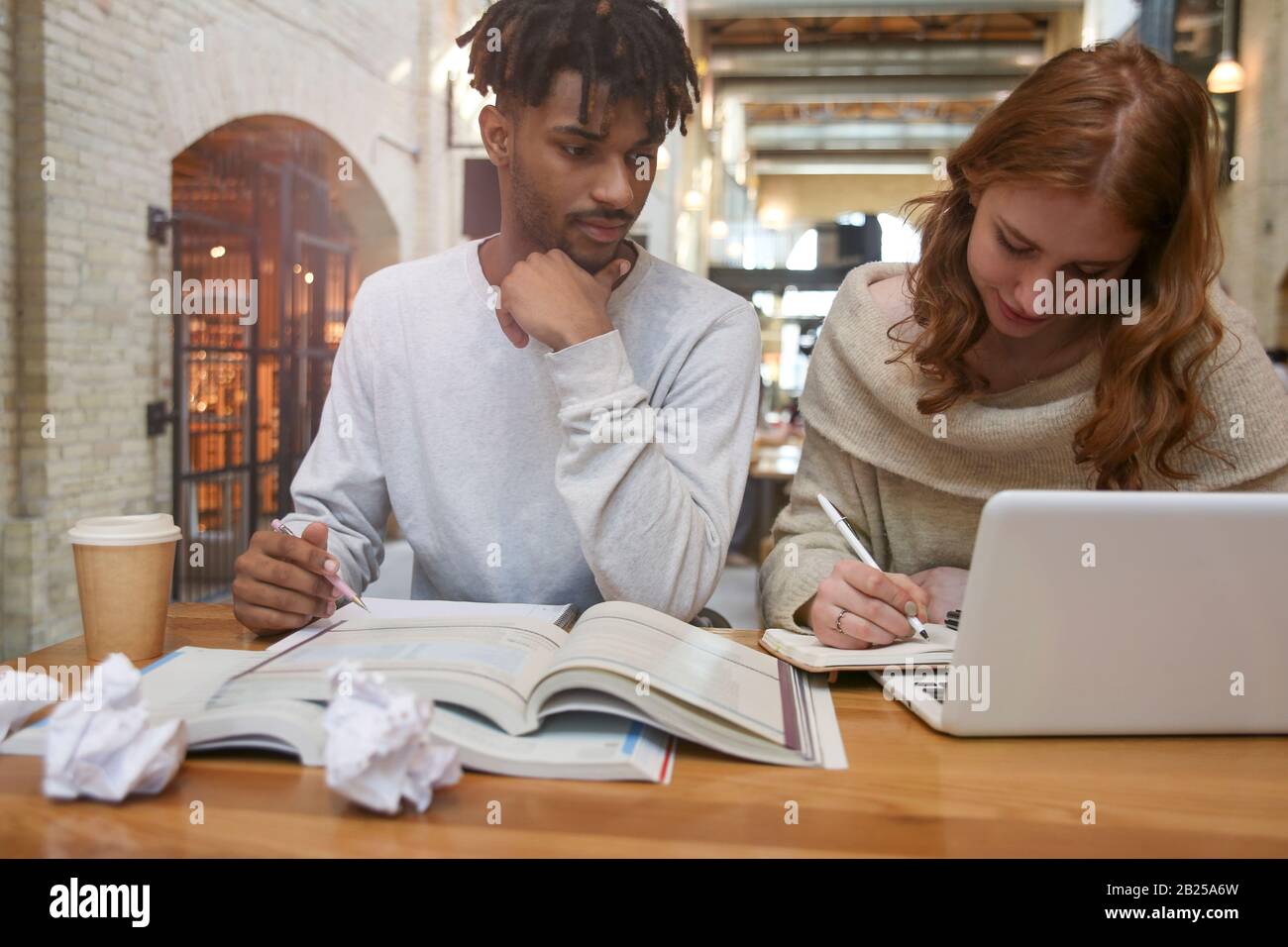 Young Students/Professionals Working in a New Project. Inspiring and ...