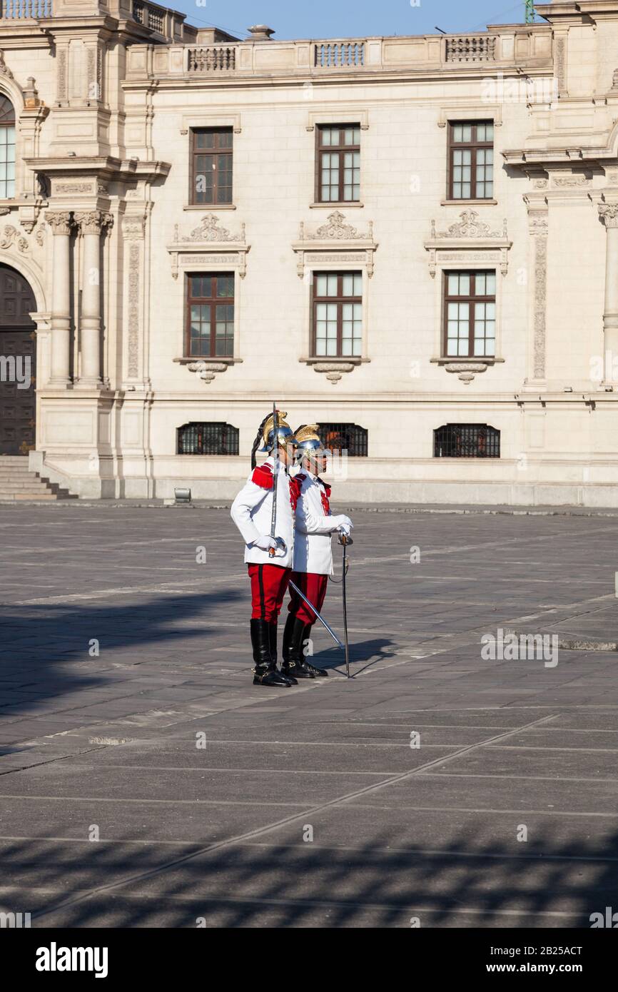 LIMA / PERU - May 10 2016: The changing of the guards with red and ...