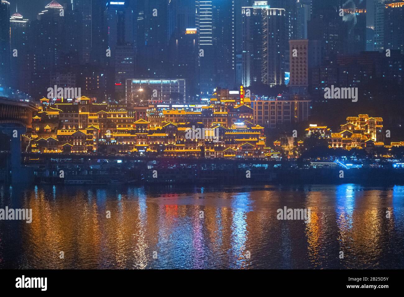 City night view of Chongqing, China. The scenery by the river. The ...