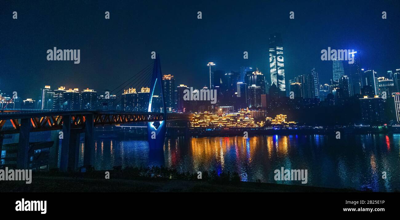 City night view of Chongqing, China. The scenery by the river. The ...