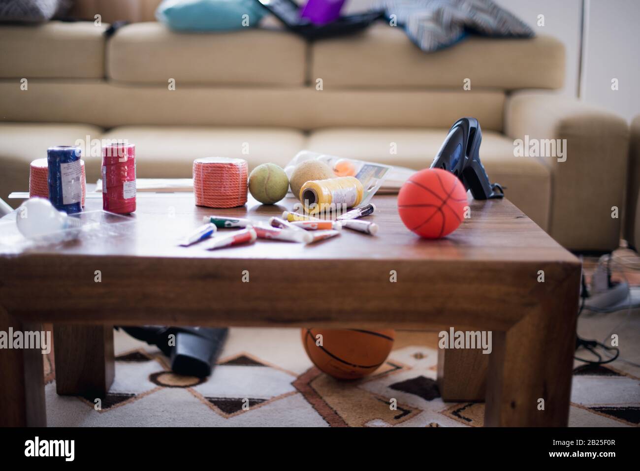 Table full of toys and science stuff for education of a child Stock ...