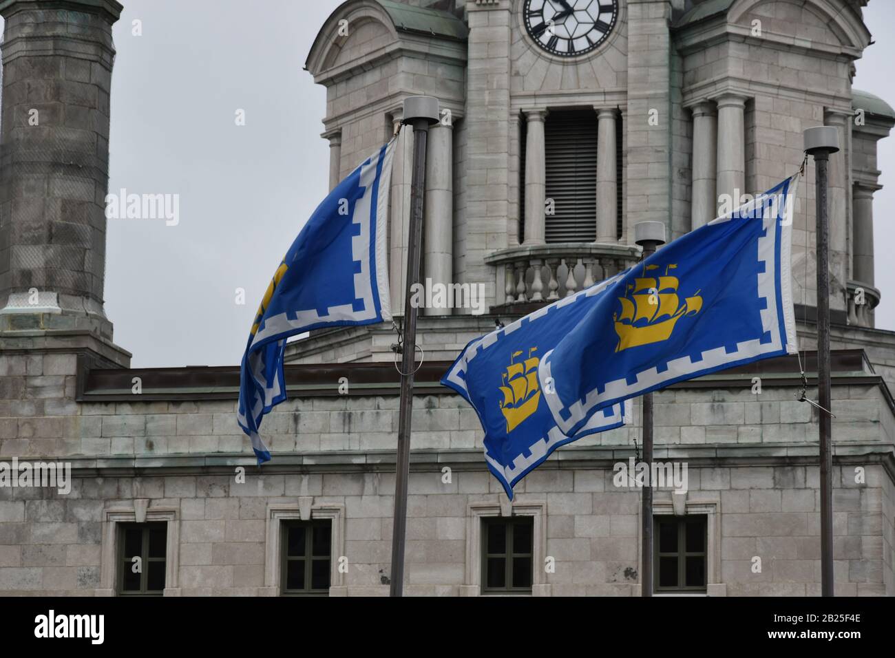 The flag of Quebec City flying over the Ville de Quebec. Canada Stock ...