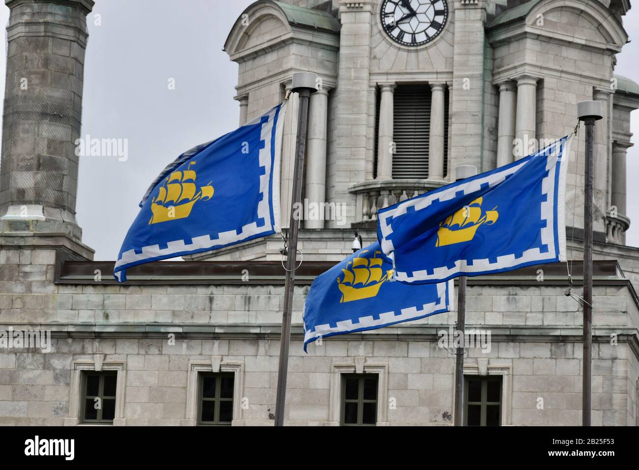 The flag of Quebec City flying over the Ville de Quebec. Canada Stock ...