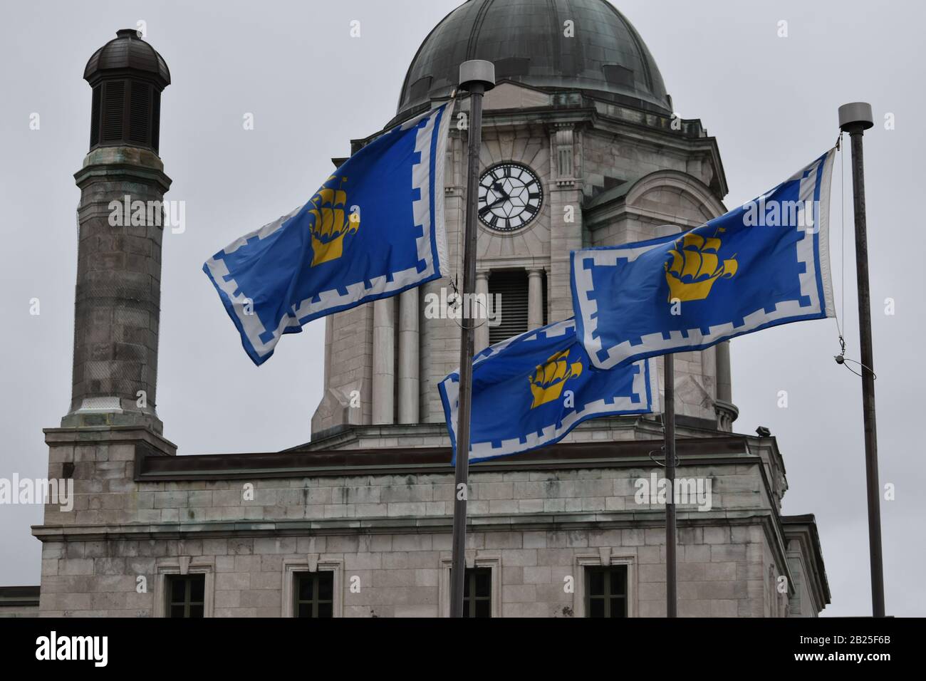 The flag of Quebec City flying over the Ville de Quebec. Canada Stock ...