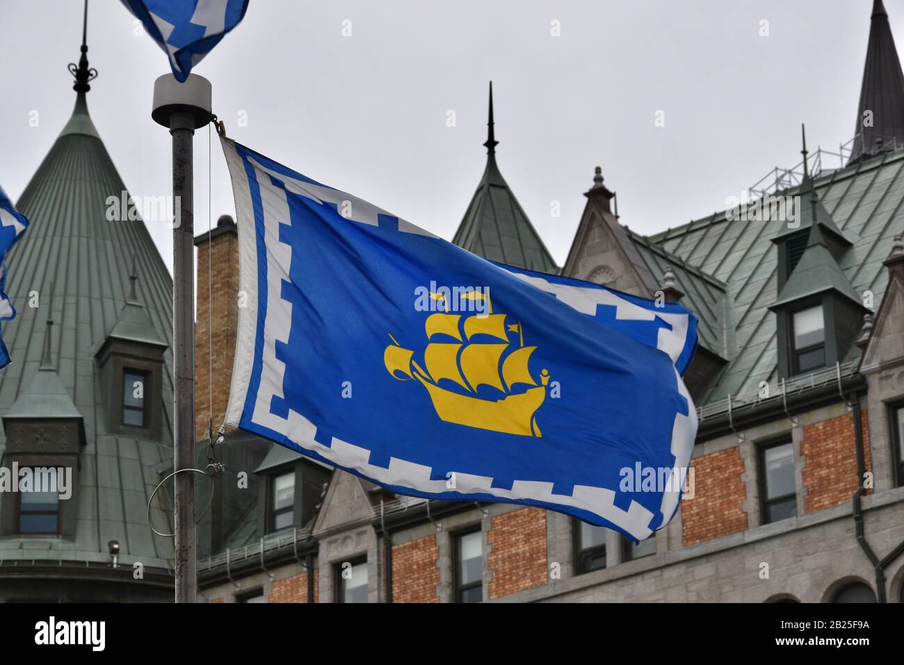 The flag of Quebec City flying over the Ville de Quebec. Canada Stock ...