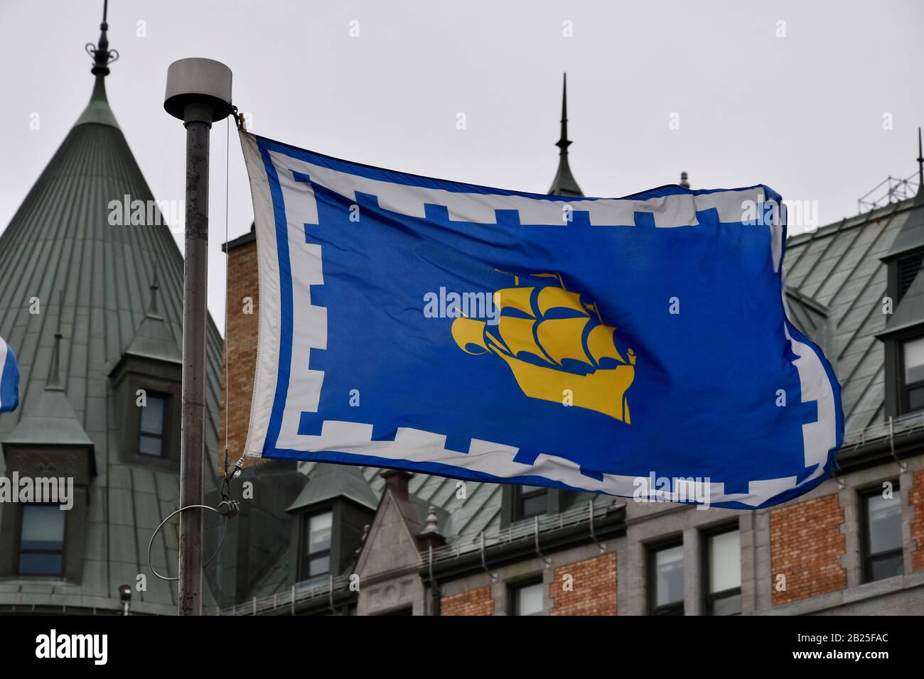 The flag of Quebec City flying over the Ville de Quebec. Canada Stock ...