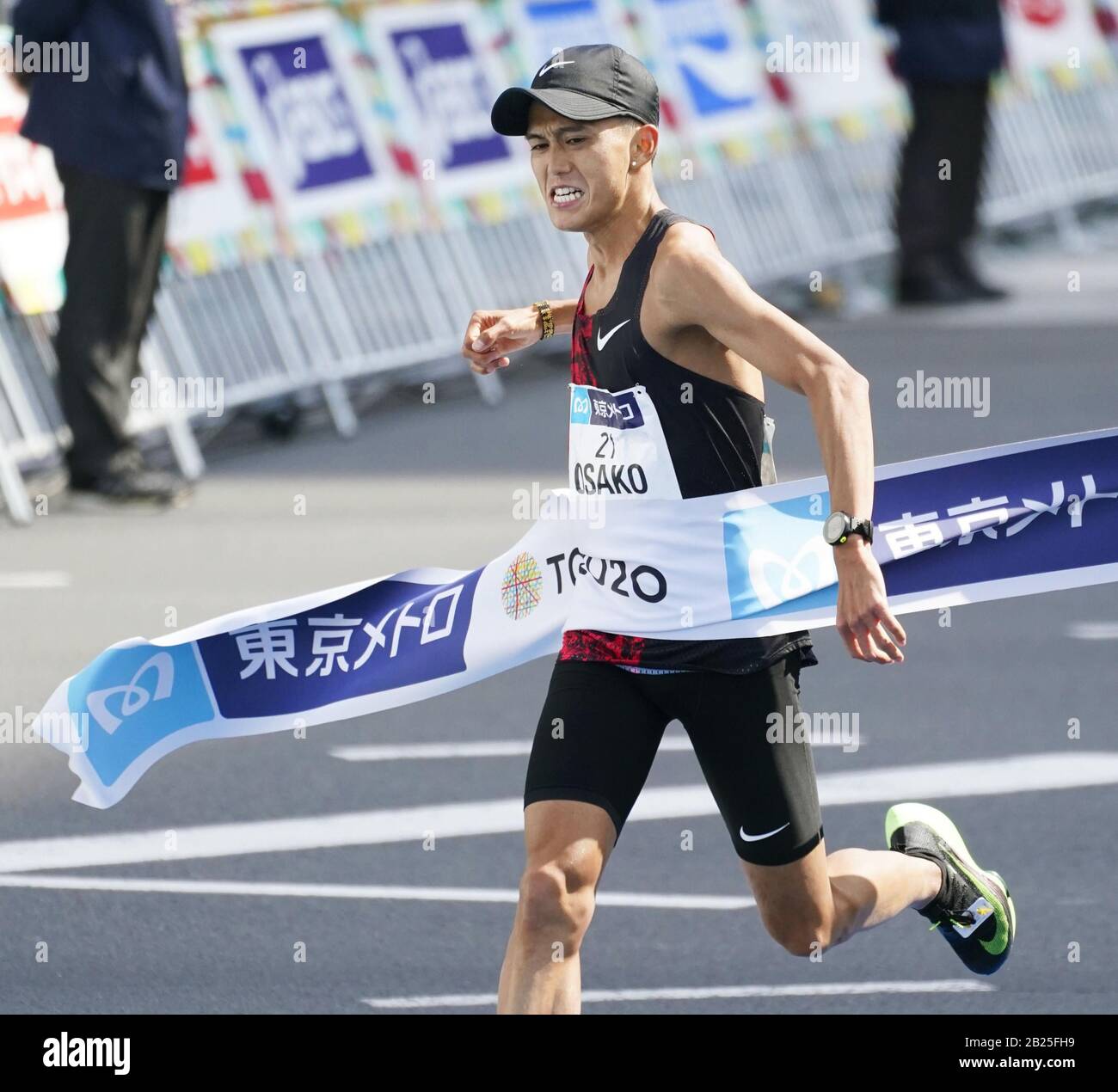 Tokyo, Japan. 01st Mar, 2020. Suguru Osako of Japan pumps his fist as ...
