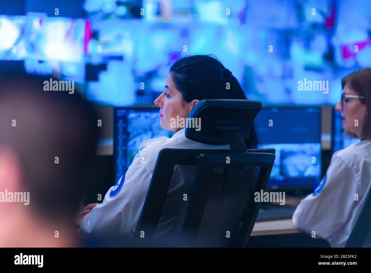In the System Control Room, Technical Operator Works at His Workstation ...