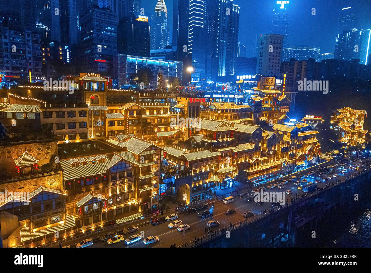 City night view of Chongqing, China. The scenery by the river. The ...