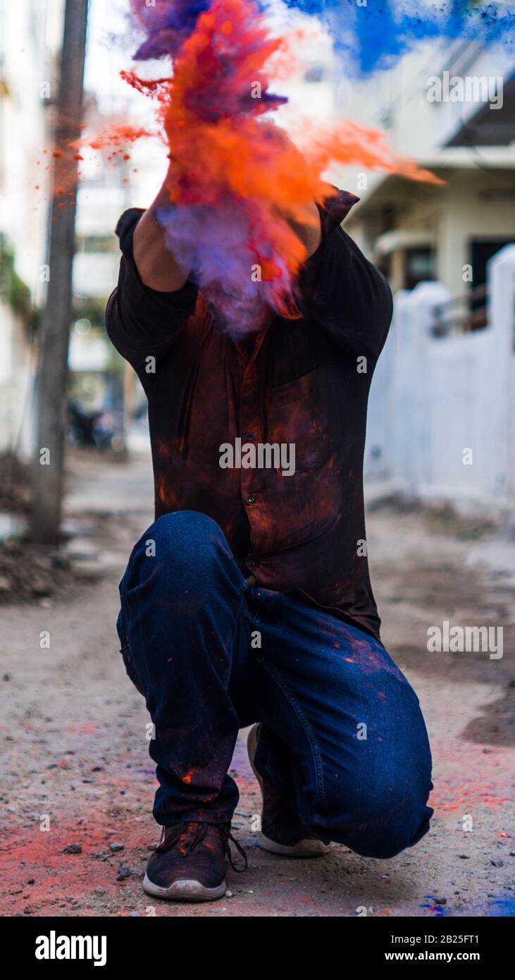 Young man in holi colors. holi is a festival of India. It is festival ...