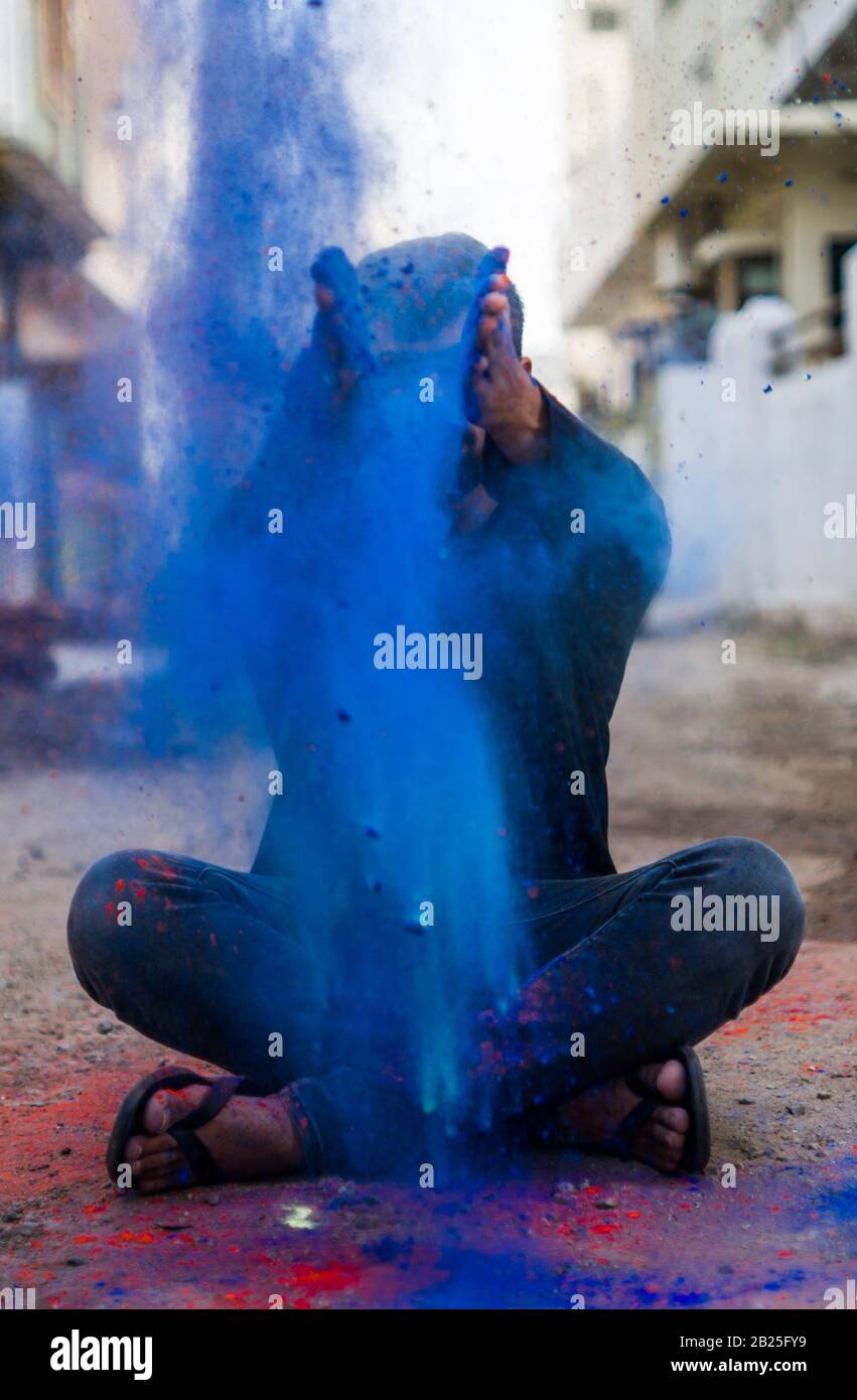 Young man in holi colors. holi is a festival of India. It is festival ...