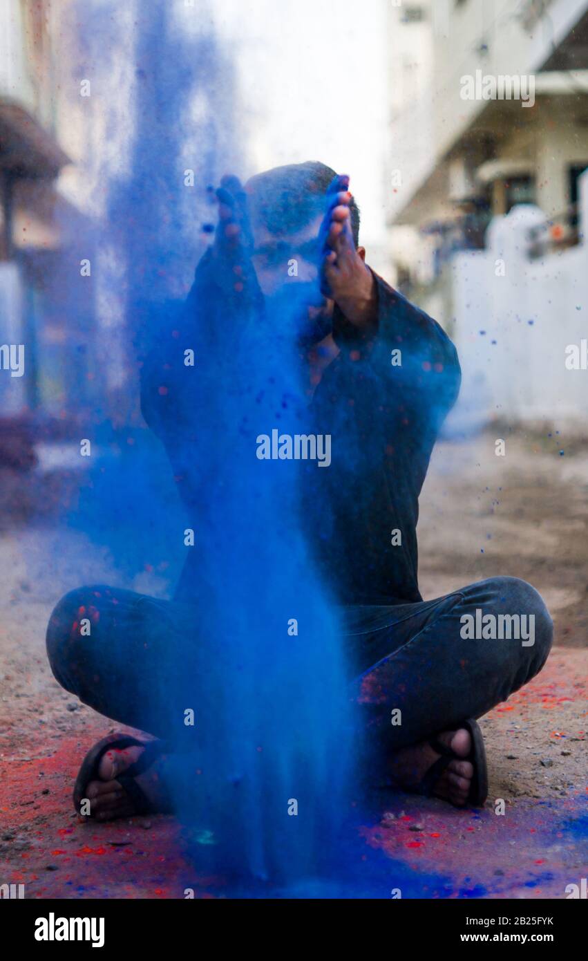 Young man in holi colors. holi is a festival of India. It is festival ...