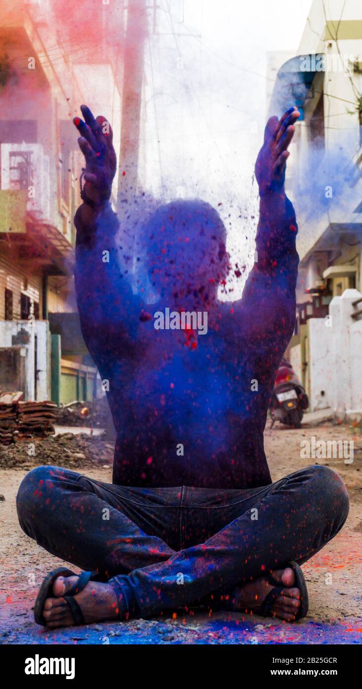 Young man in holi colors. holi is a festival of India. It is festival ...