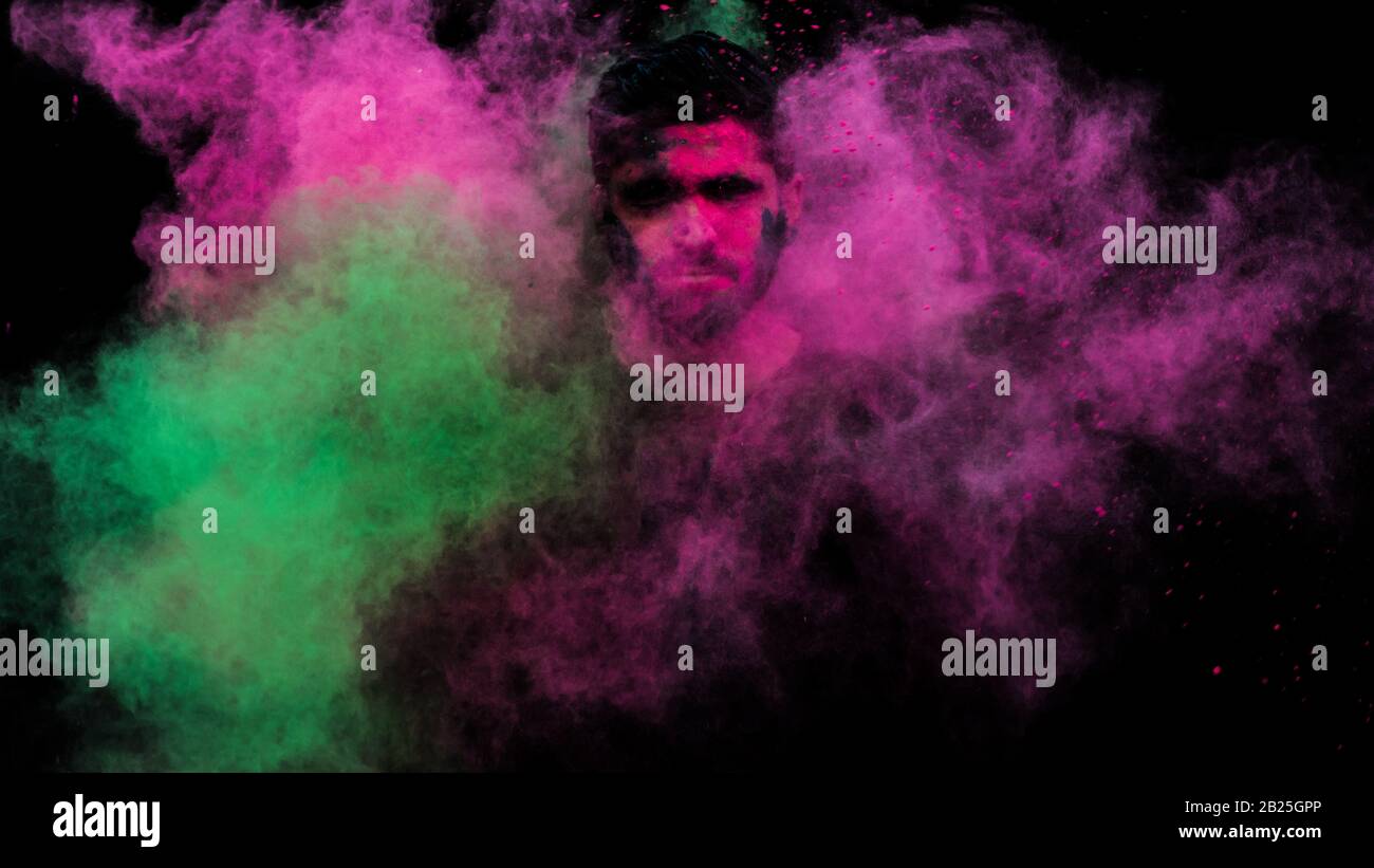 Young man in holi colors. holi is a festival of India. It is festival ...