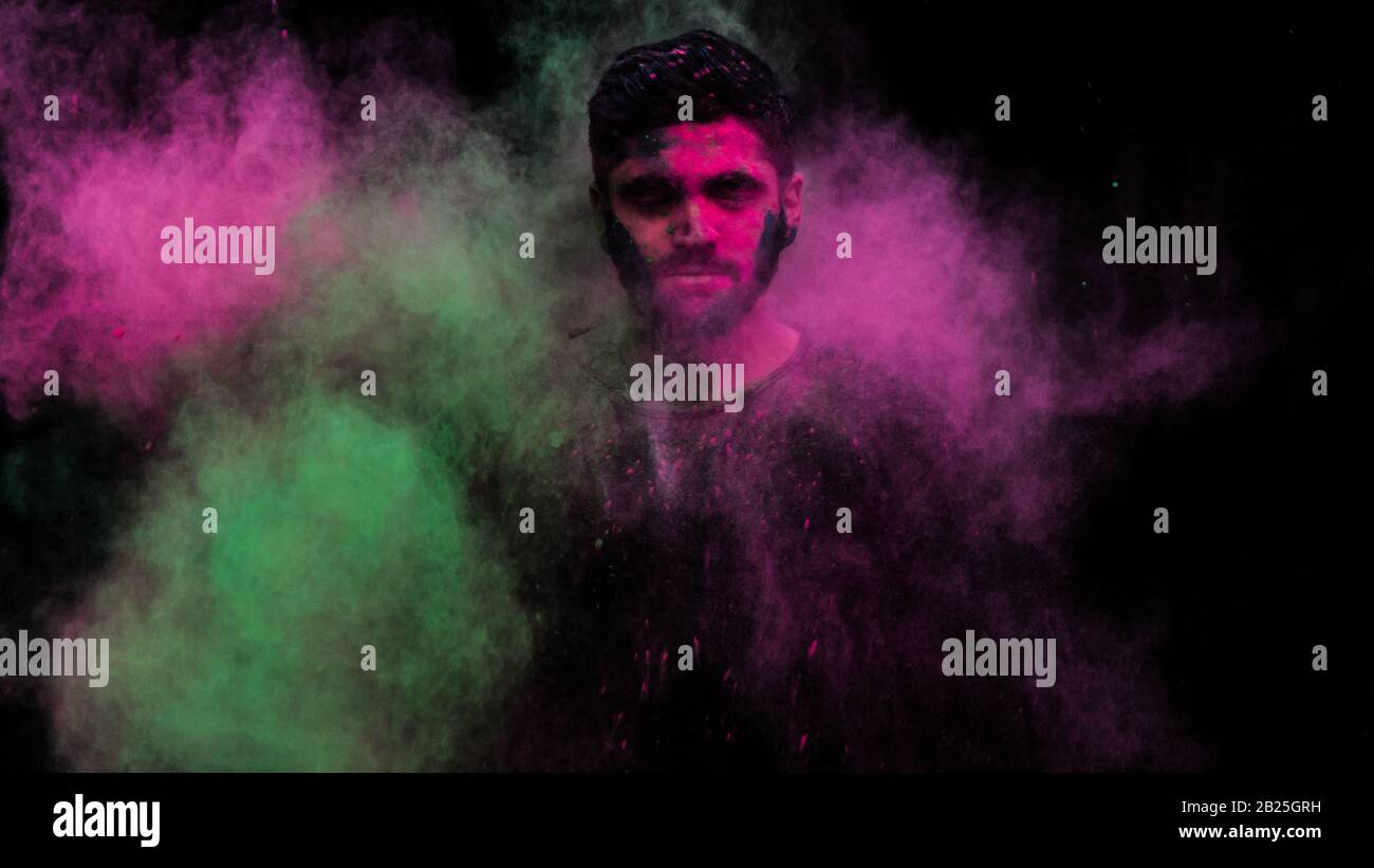 Young man in holi colors. holi is a festival of India. It is festival ...