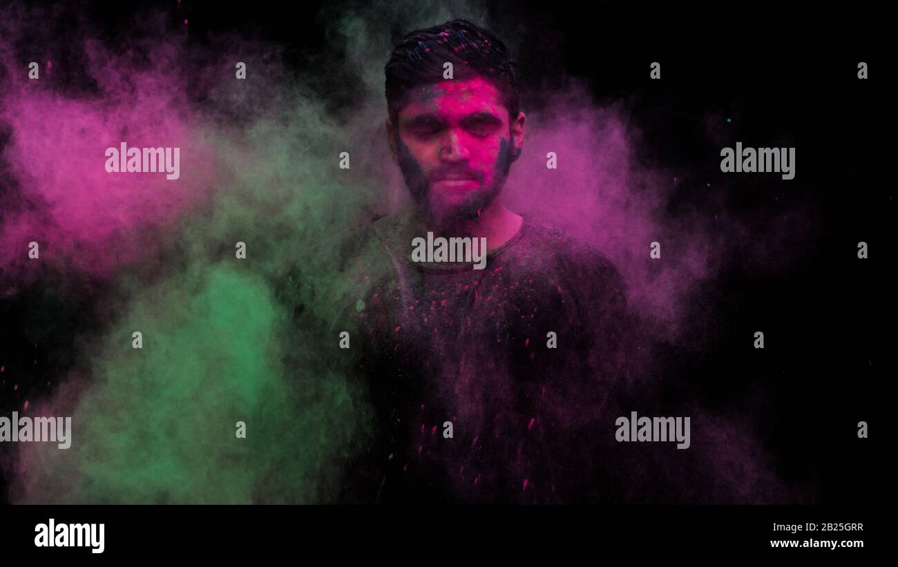 Young man in holi colors. holi is a festival of India. It is festival ...