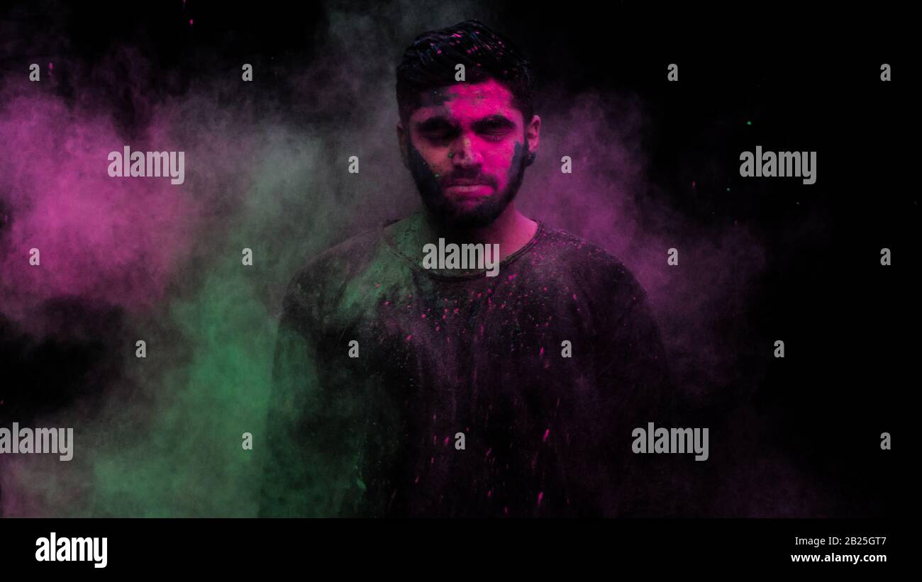 Young man in holi colors. holi is a festival of India. It is festival ...